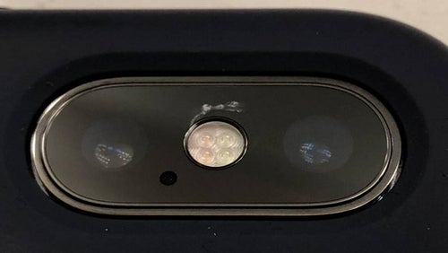 Apple iPhone X users find mysterious cracks on the glass covering the ...