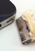 iPhone 4's USB port catches on fire and subsequently melts cable ...